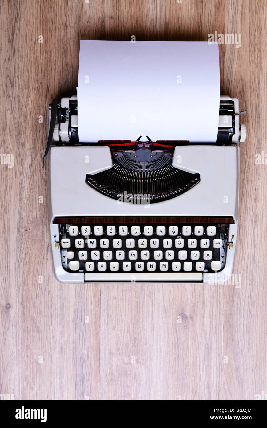 old typewriter on wooden ground from above Stock Photo - Alamy