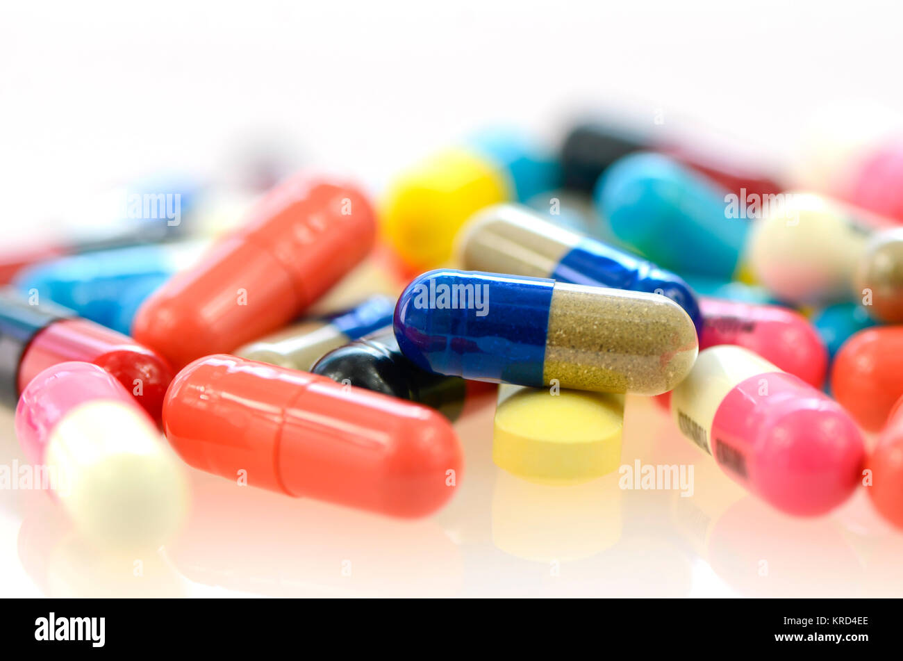 Colorful of oral medications on White Background Stock Photo - Alamy