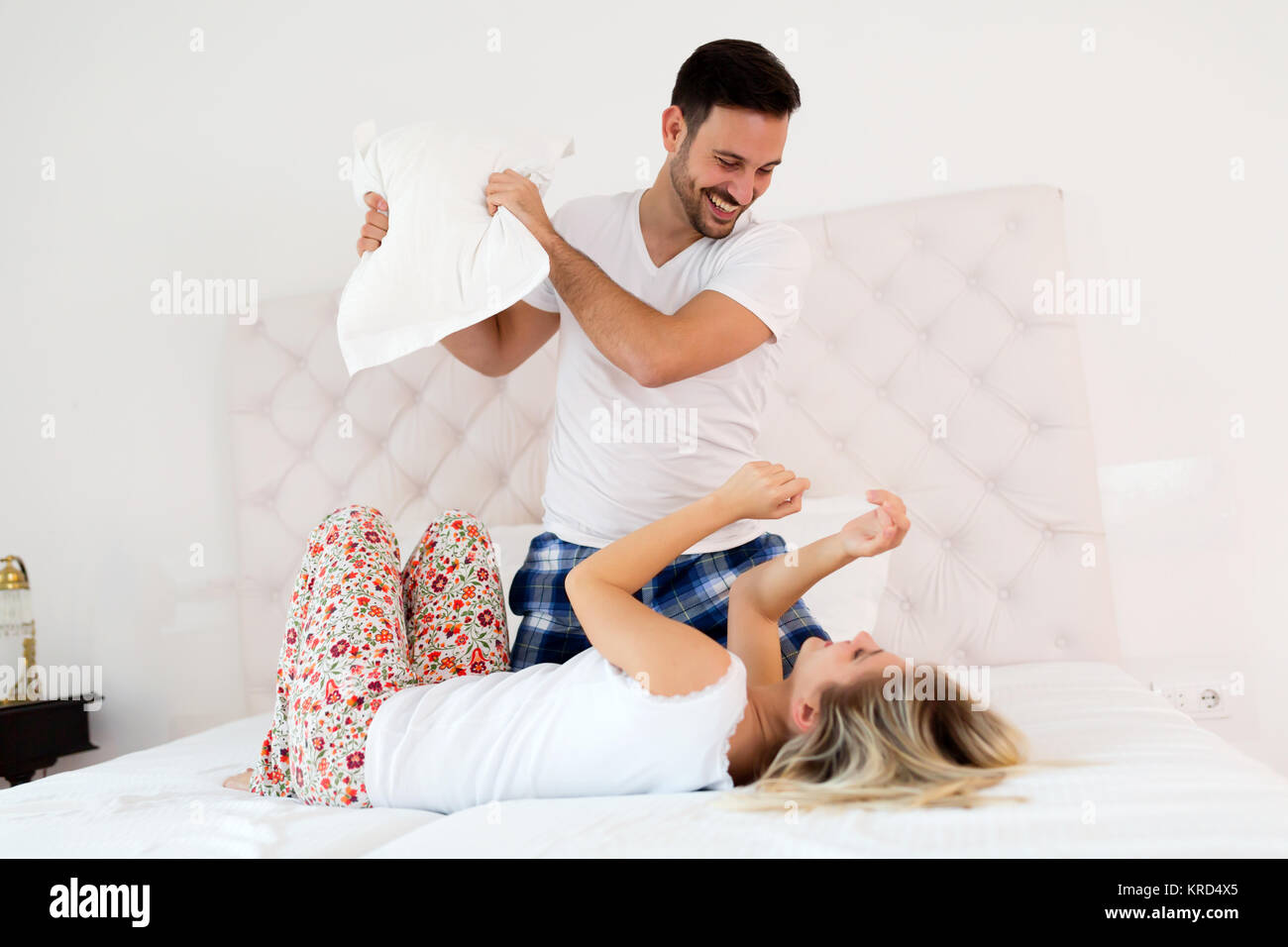 Couple fighting in bed hi-res stock photography and images - Alamy