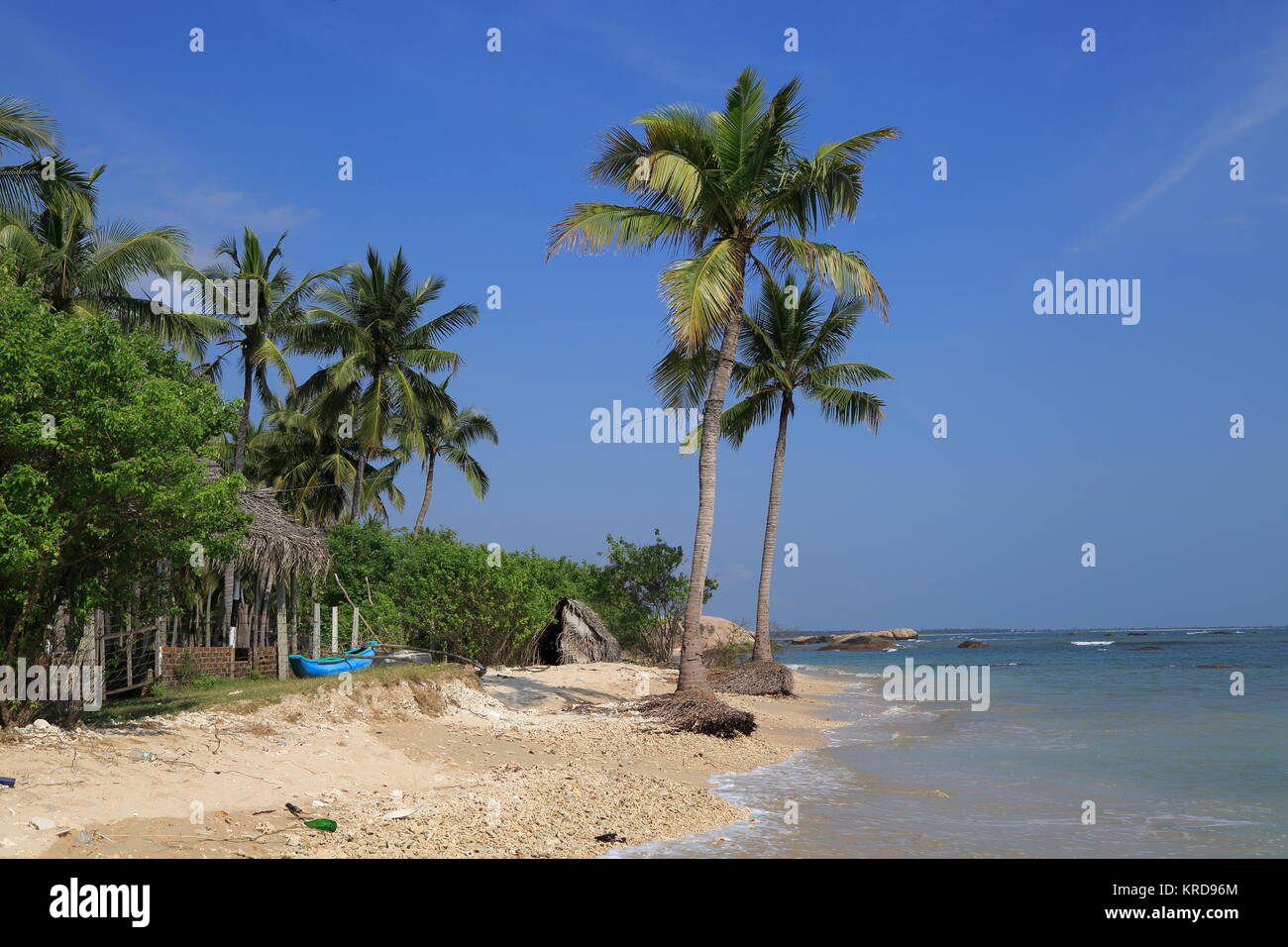 Ocean and sandy tropical beach at Pasikudah Bay, Eastern Province, Sri ...