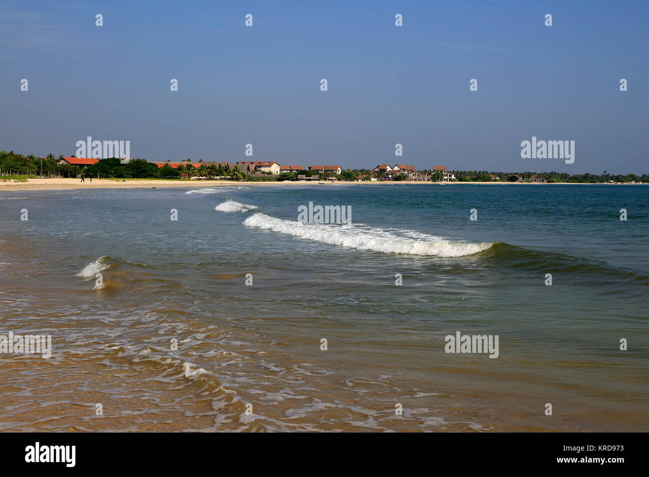 Ocean and sandy tropical beach at Pasikudah Bay, Eastern Province, Sri ...