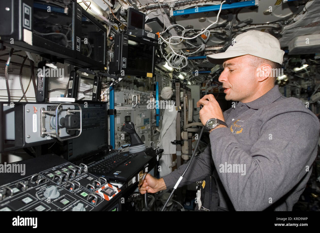 Lee Archambault at the Canadarm2 controls on ISS Stock Photo - Alamy