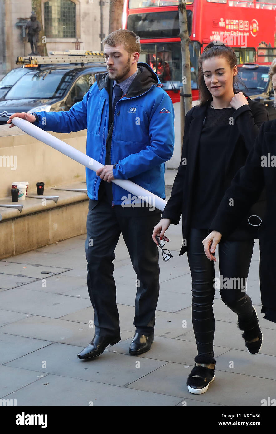 Tom and Kate Evans arrive at the High Court in London as a High Court ...