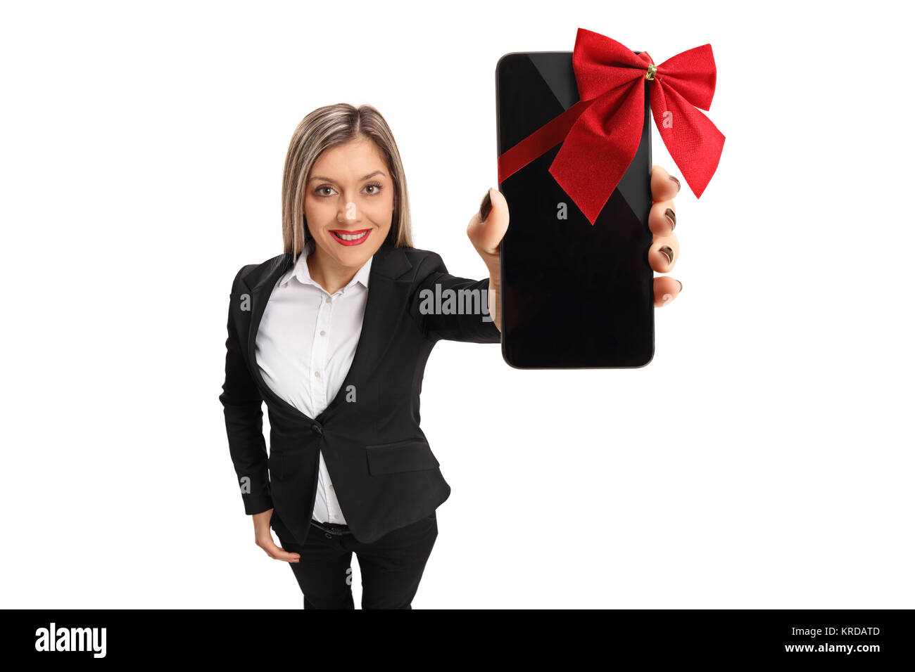 Formally dressed woman showing a phone wrapped with a red ribbon as a ...