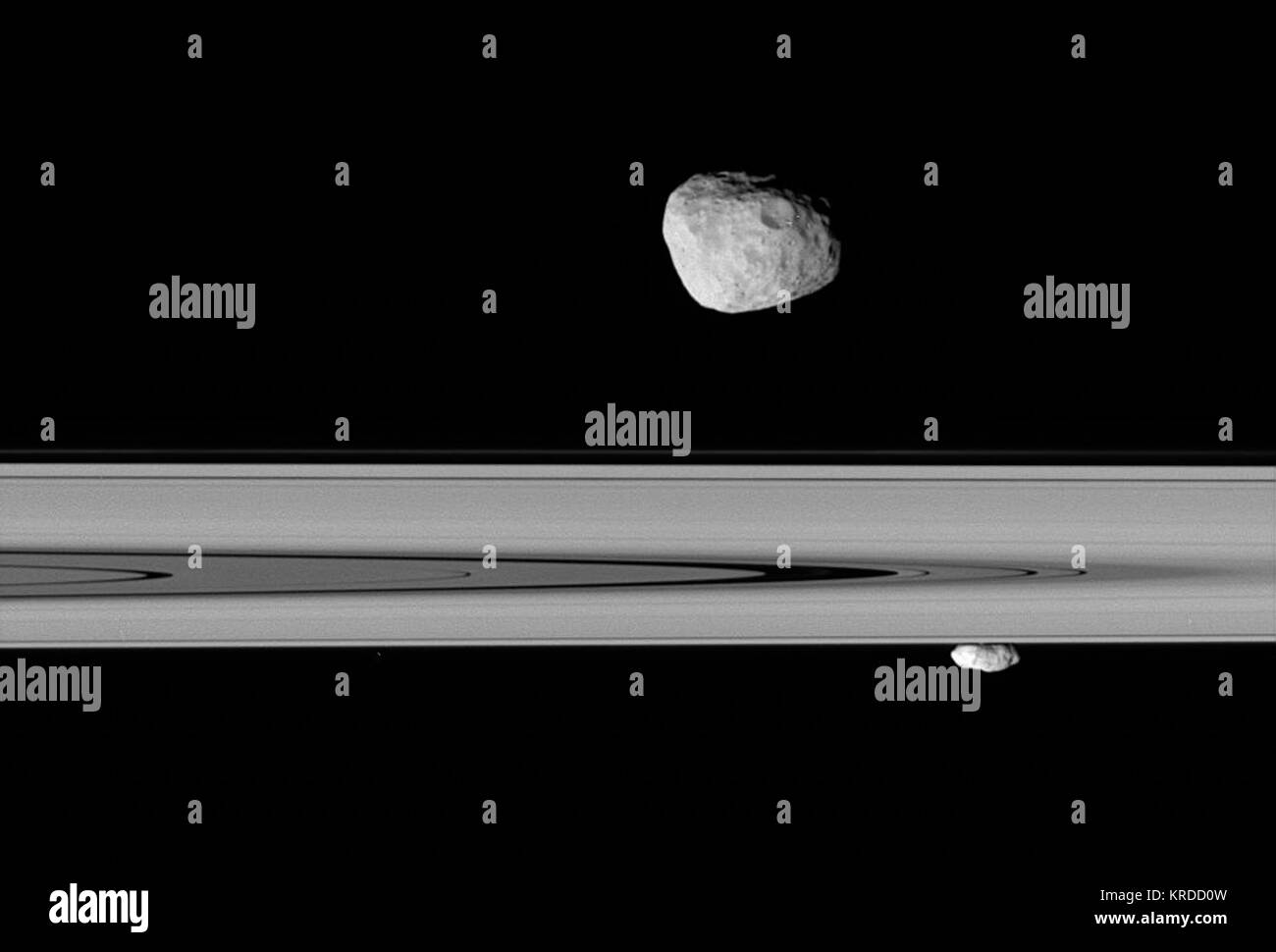 Saturn's moons Janus and Prometheus PIA08192 (NASA Stock Photo - Alamy
