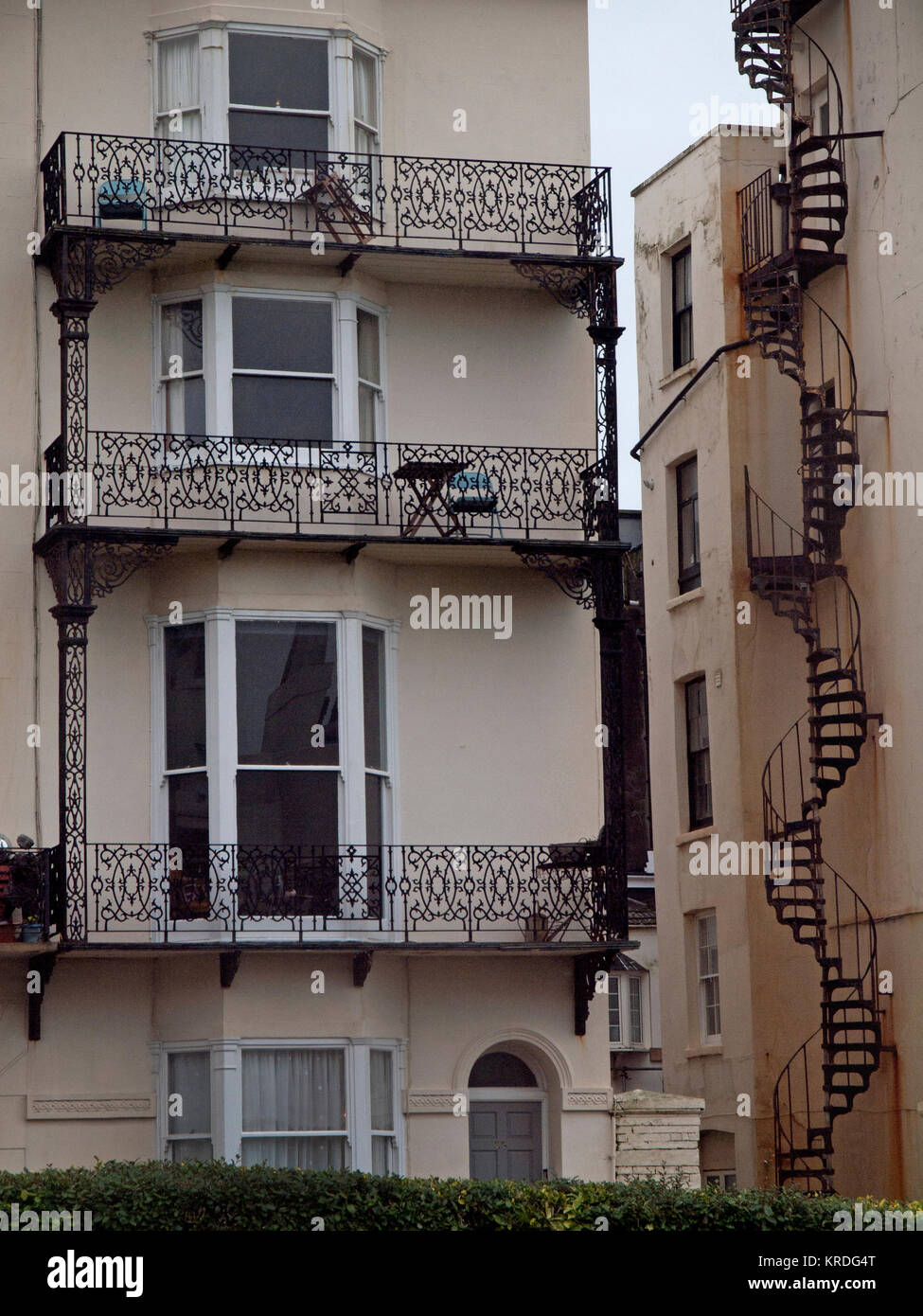 Balconies and a spiral fire escape stairwell in Brighton Stock Photo ...