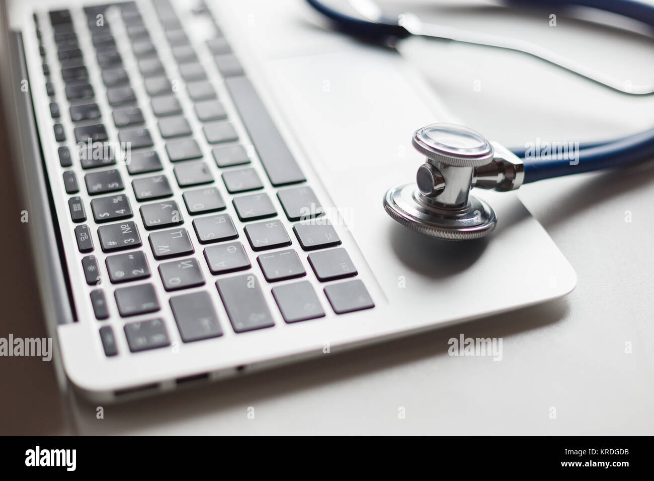 Virtual doctor. Computer and stethoscope Stock Photo - Alamy