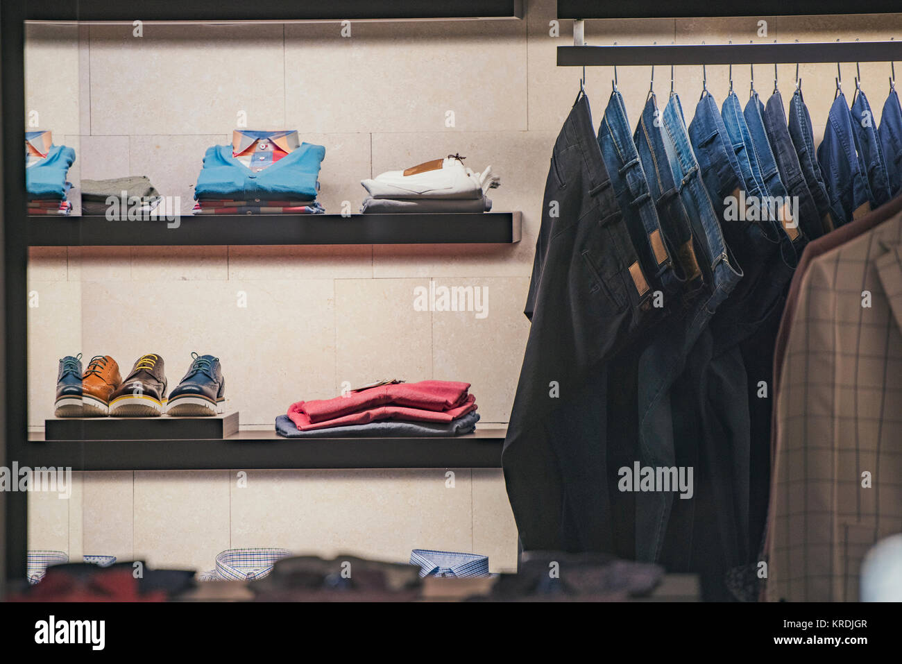 Elegant men clothing in a store Stock Photo - Alamy
