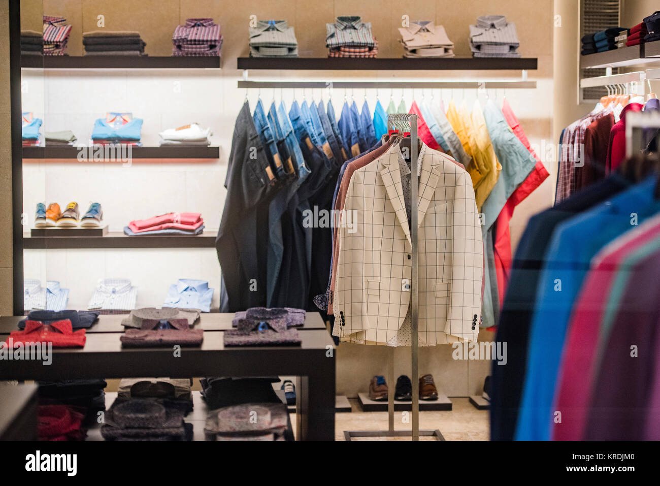 Elegant men clothing in a store Stock Photo - Alamy