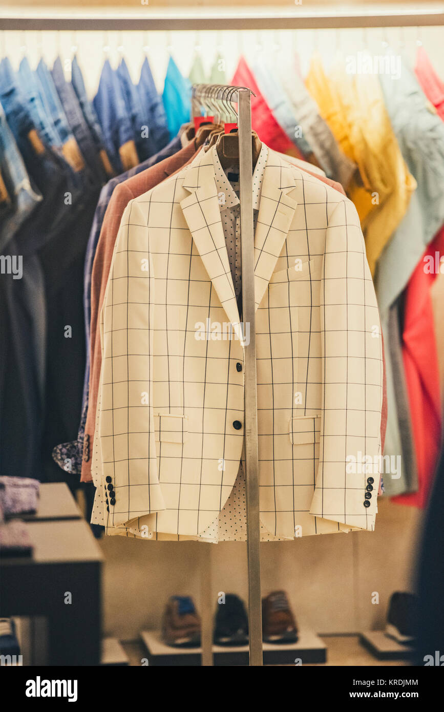 Elegant men clothing in a store Stock Photo - Alamy