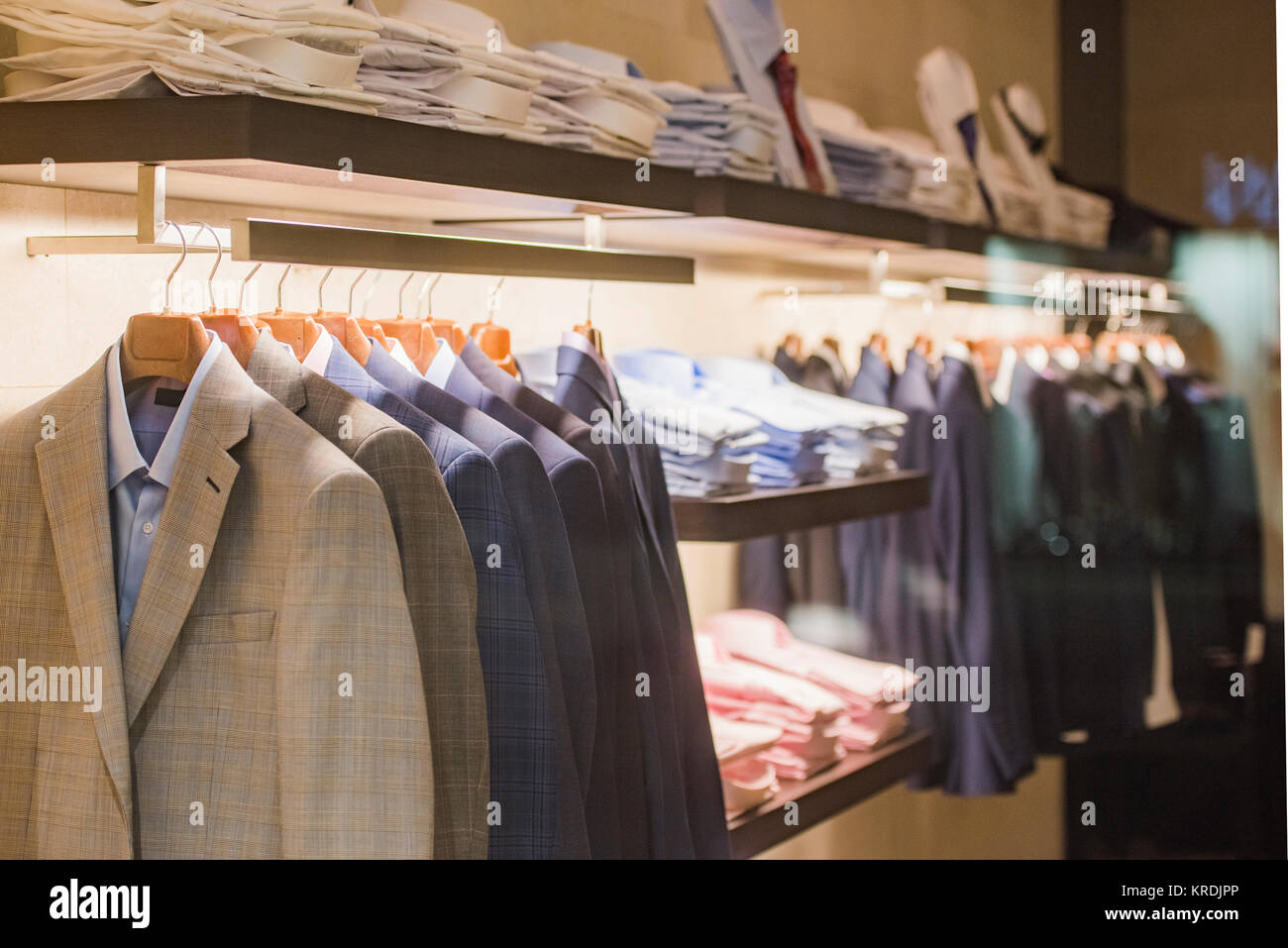 Elegant men clothing in a store Stock Photo - Alamy