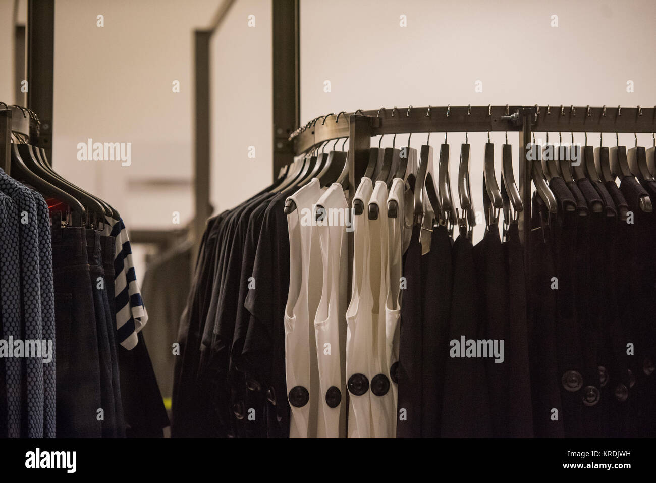Women clothing on racks in a fashion store Stock Photo - Alamy