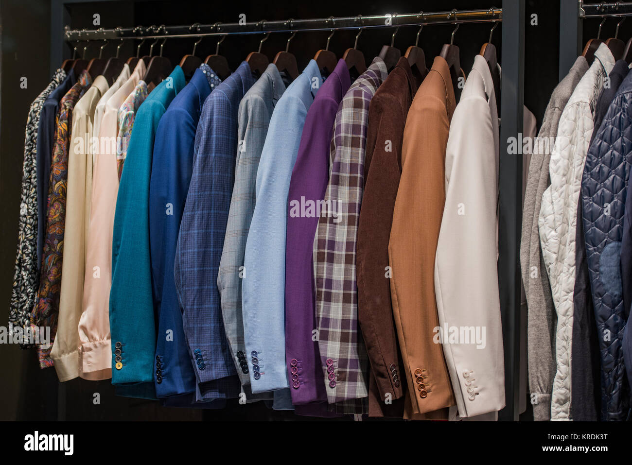 Elegant men clothing in a store Stock Photo - Alamy