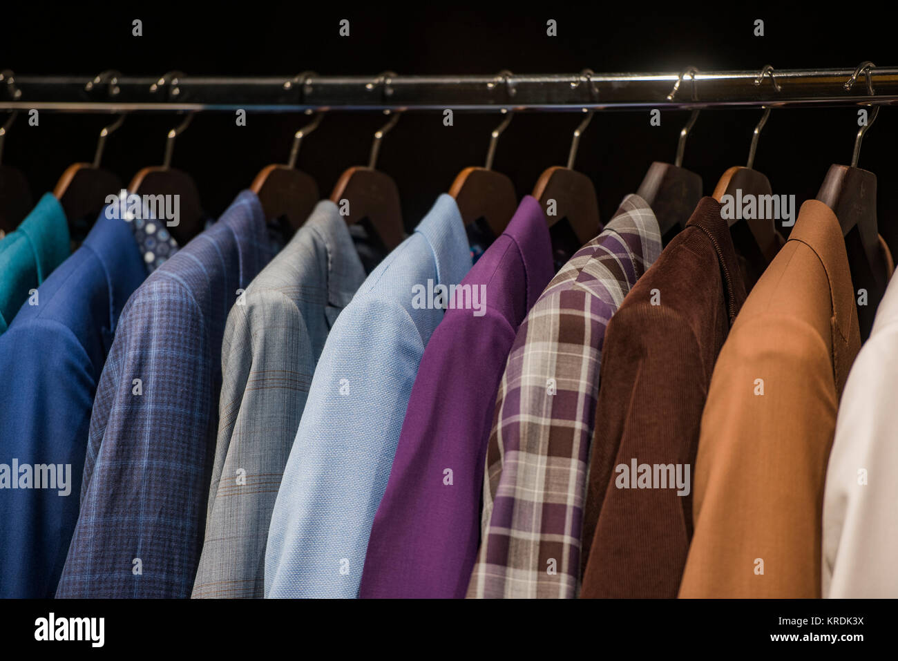Elegant men clothing in a store Stock Photo - Alamy