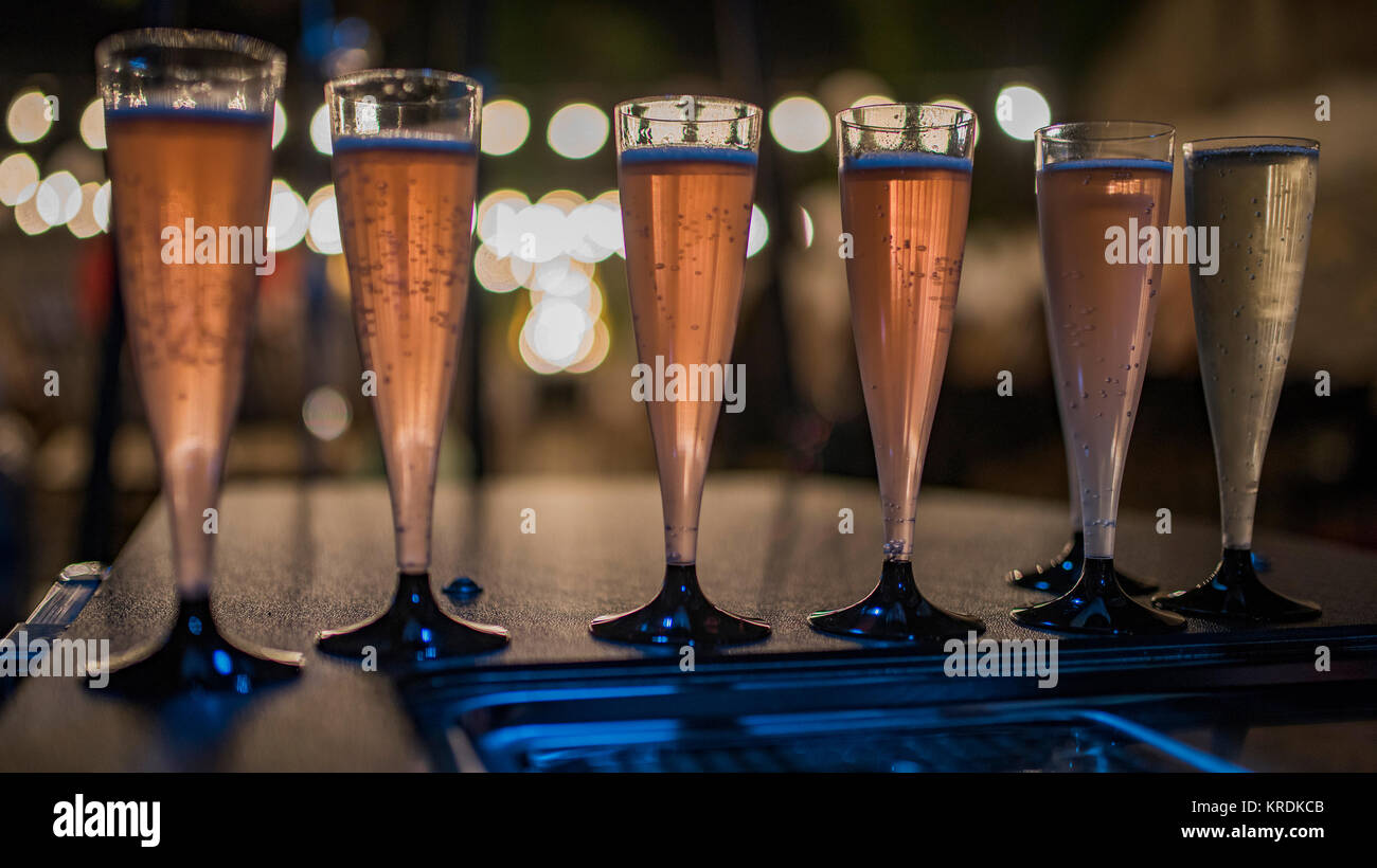 Glasses with champagne at night Stock Photo - Alamy
