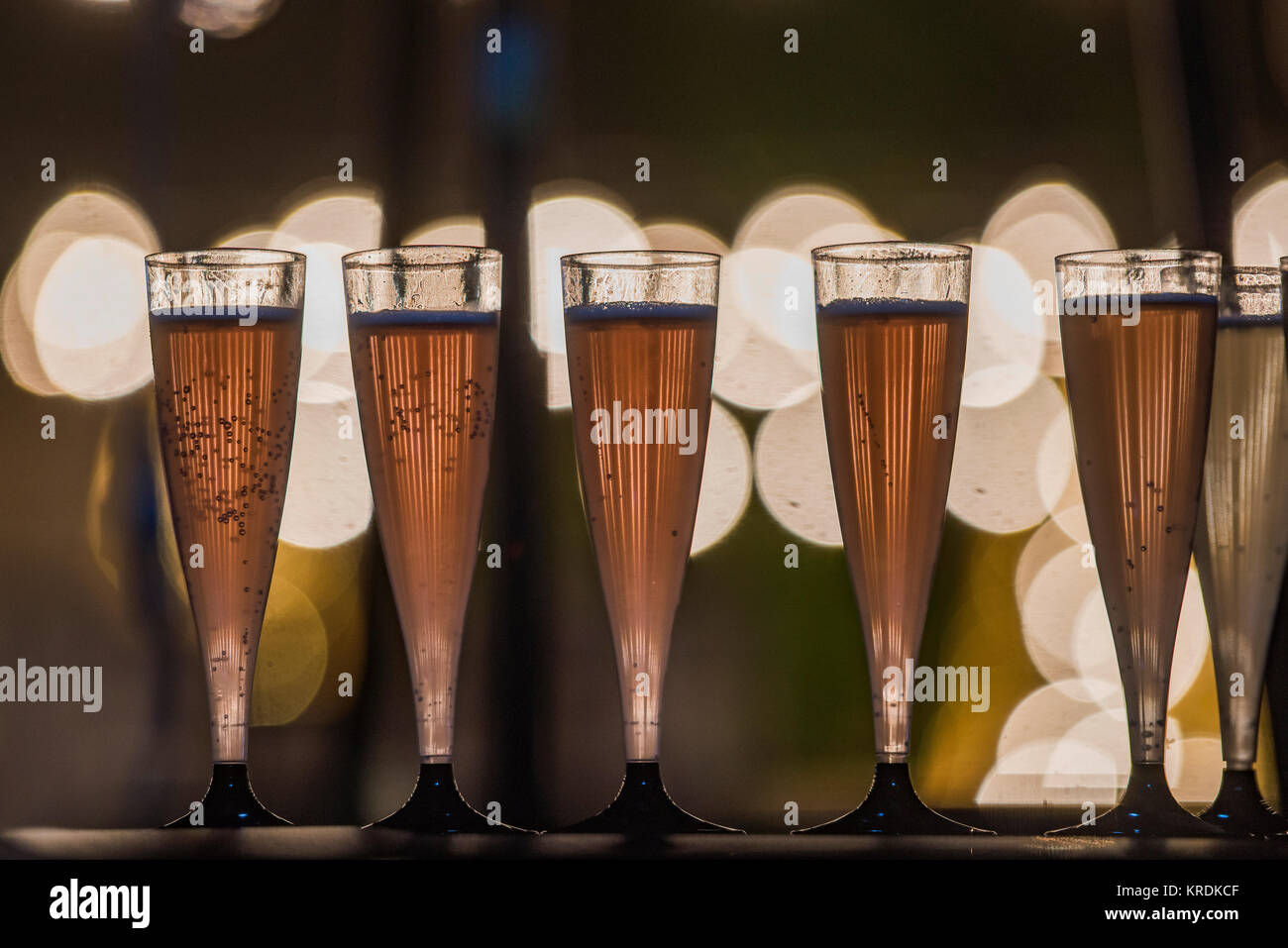 Glasses with champagne at night Stock Photo - Alamy