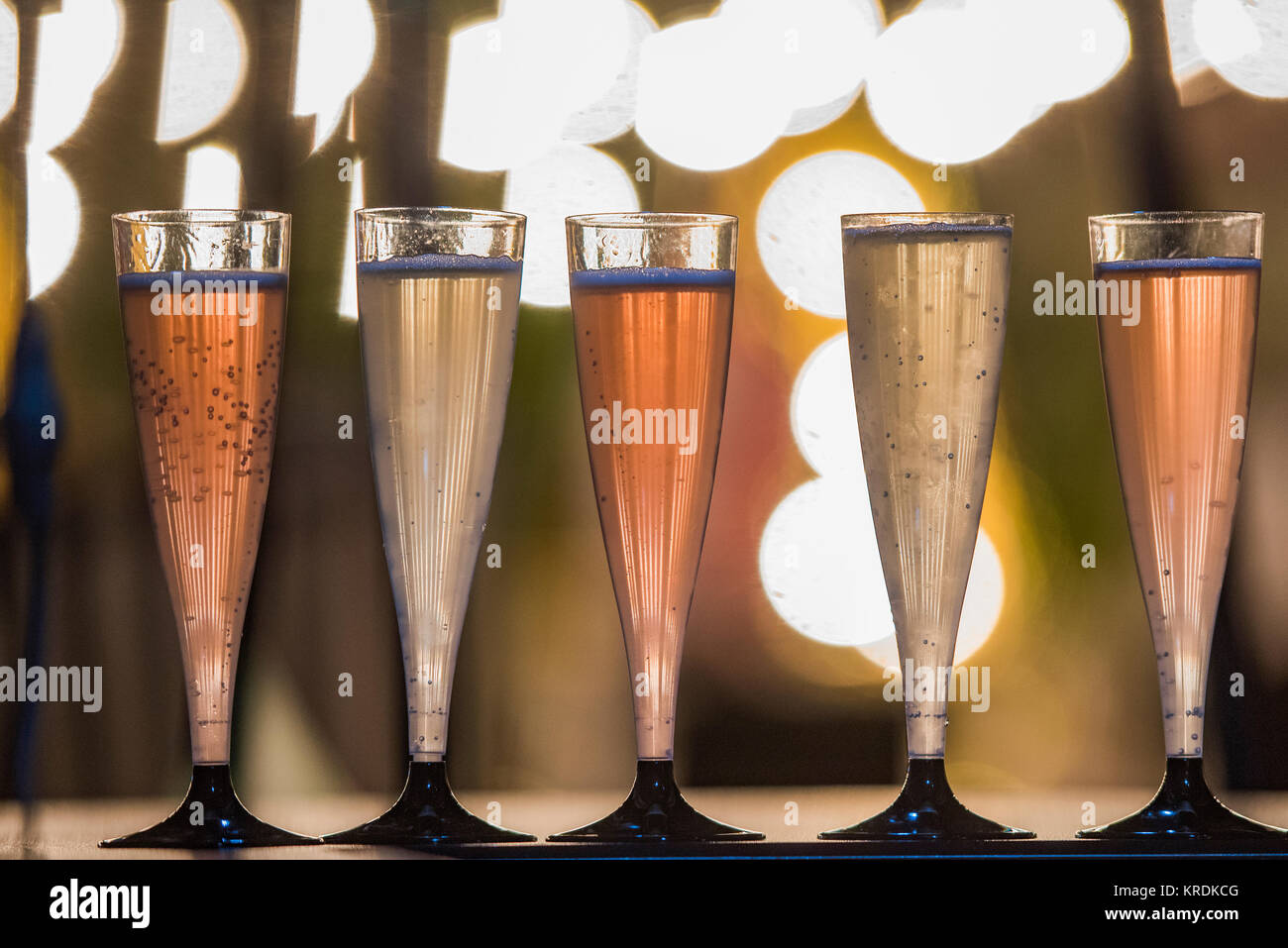 Glasses with champagne at night Stock Photo - Alamy