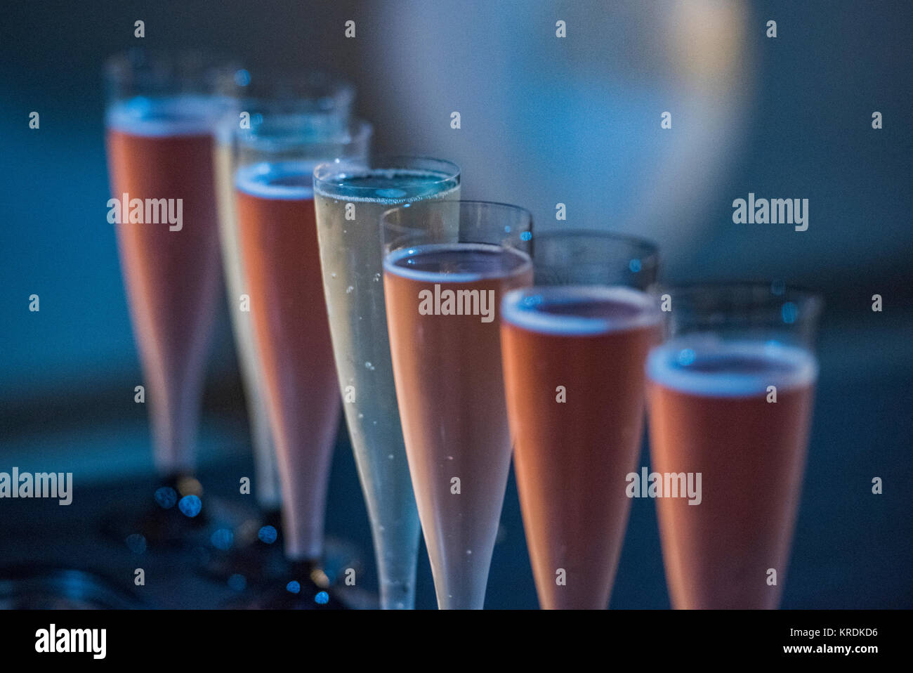 Glasses with champagne at night Stock Photo - Alamy