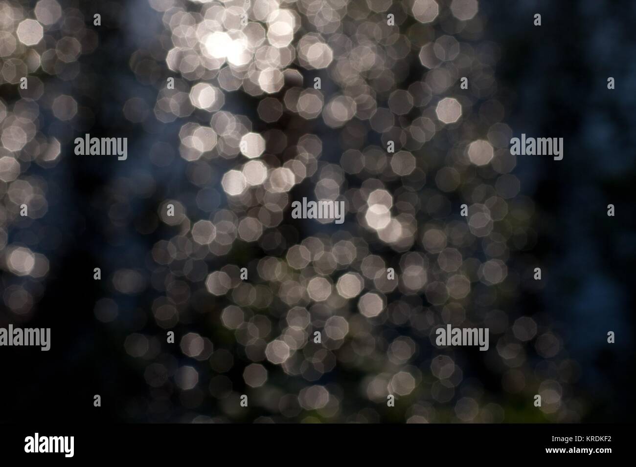 flicker of light on a dark background Stock Photo - Alamy