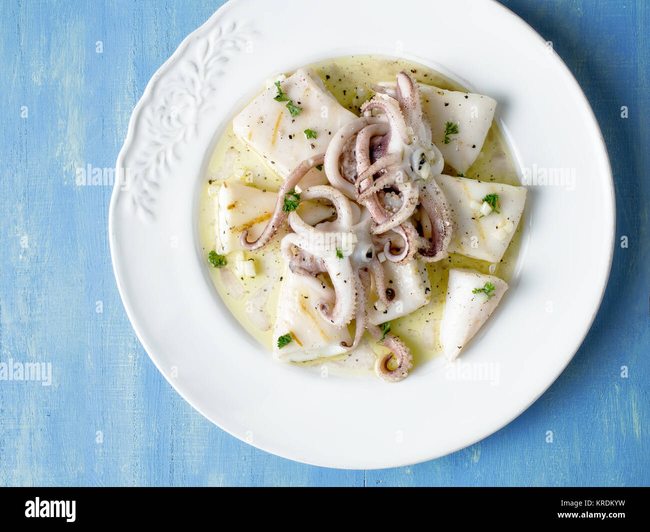 rustic mediterranean grill squid Stock Photo - Alamy