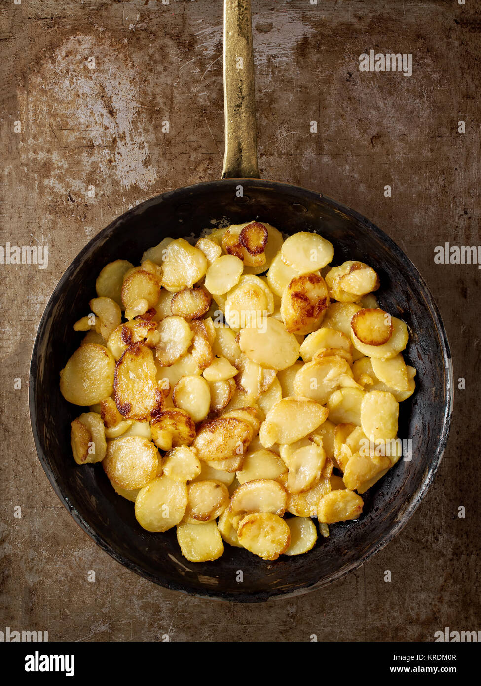 rustic golden german pan fried potato bratkartofflen Stock Photo - Alamy