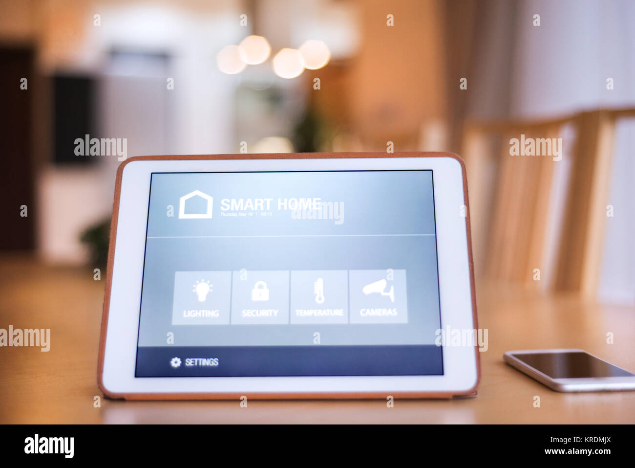 A tablet with smart home screen Stock Photo - Alamy