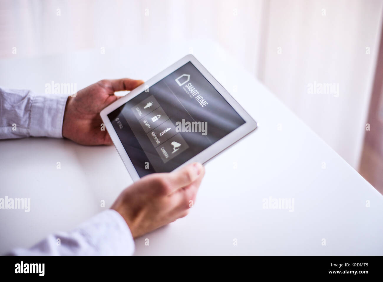 A tablet with smart home screen Stock Photo - Alamy