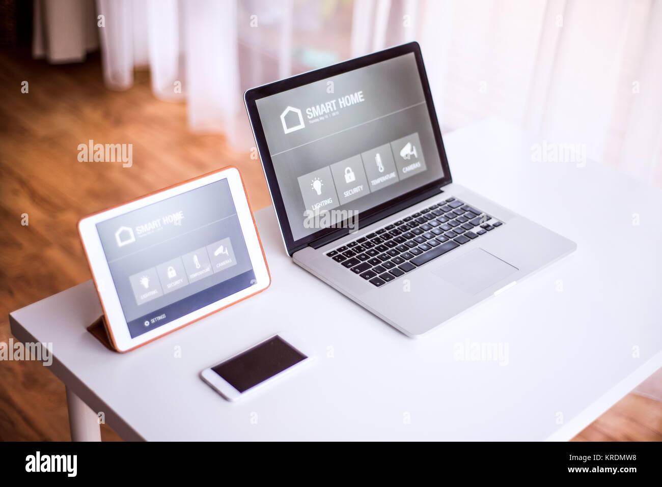 A tablet with smart home screen Stock Photo - Alamy