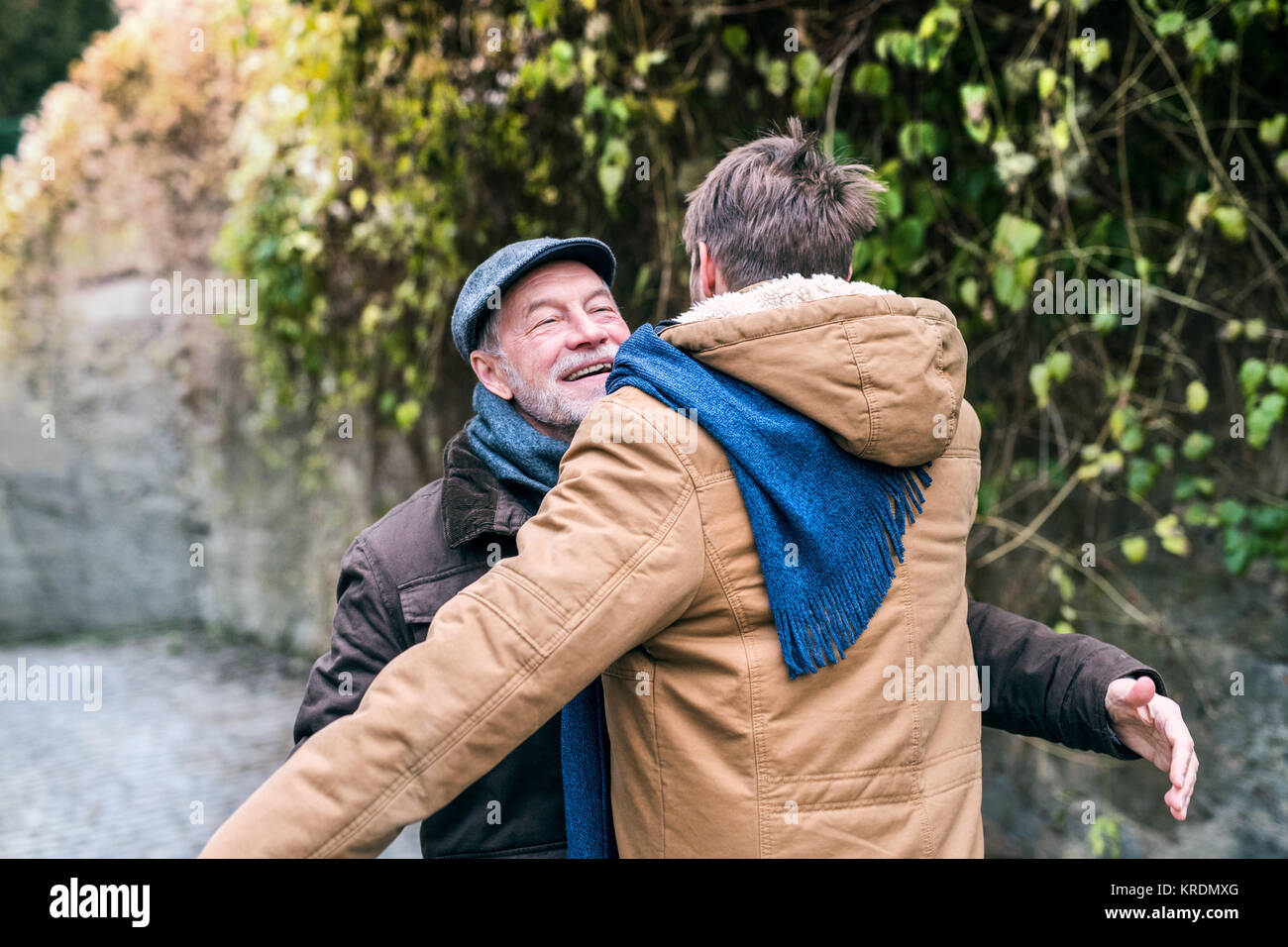 Two old men hugging hi-res stock photography and images - Alamy