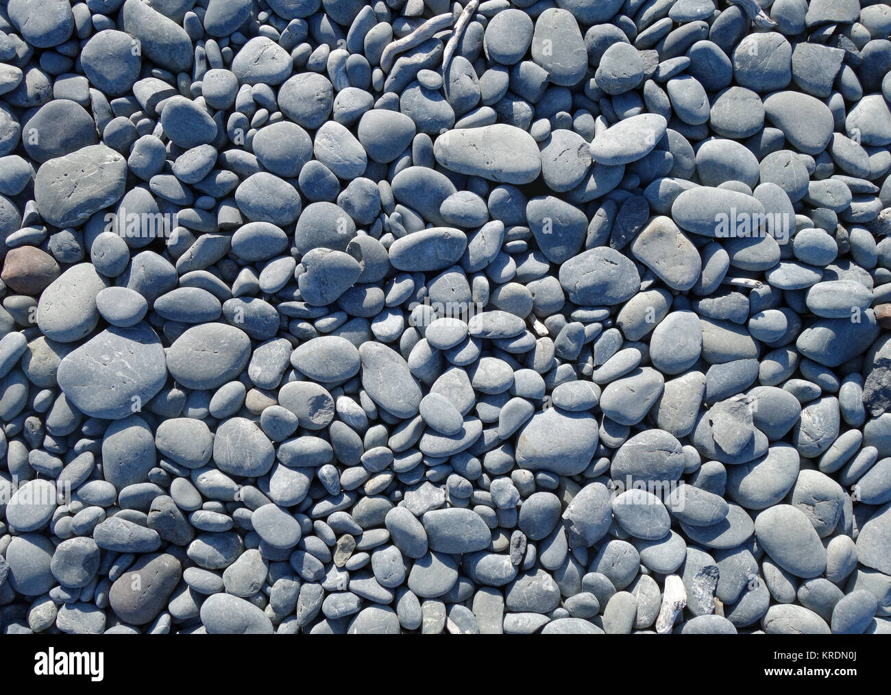 pebbles background texture Stock Photo - Alamy