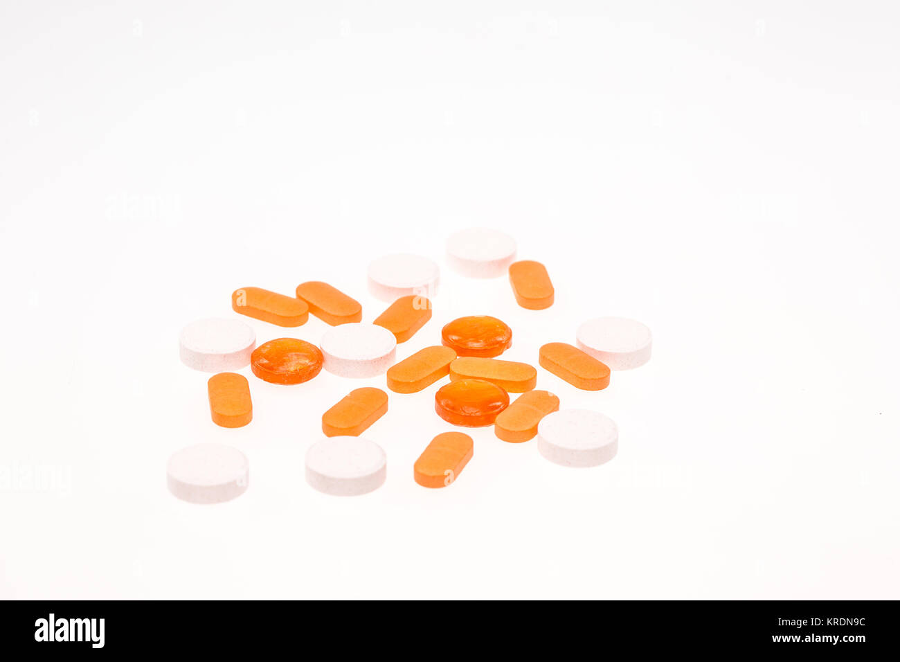 Capsules isolated on white background Stock Photo - Alamy