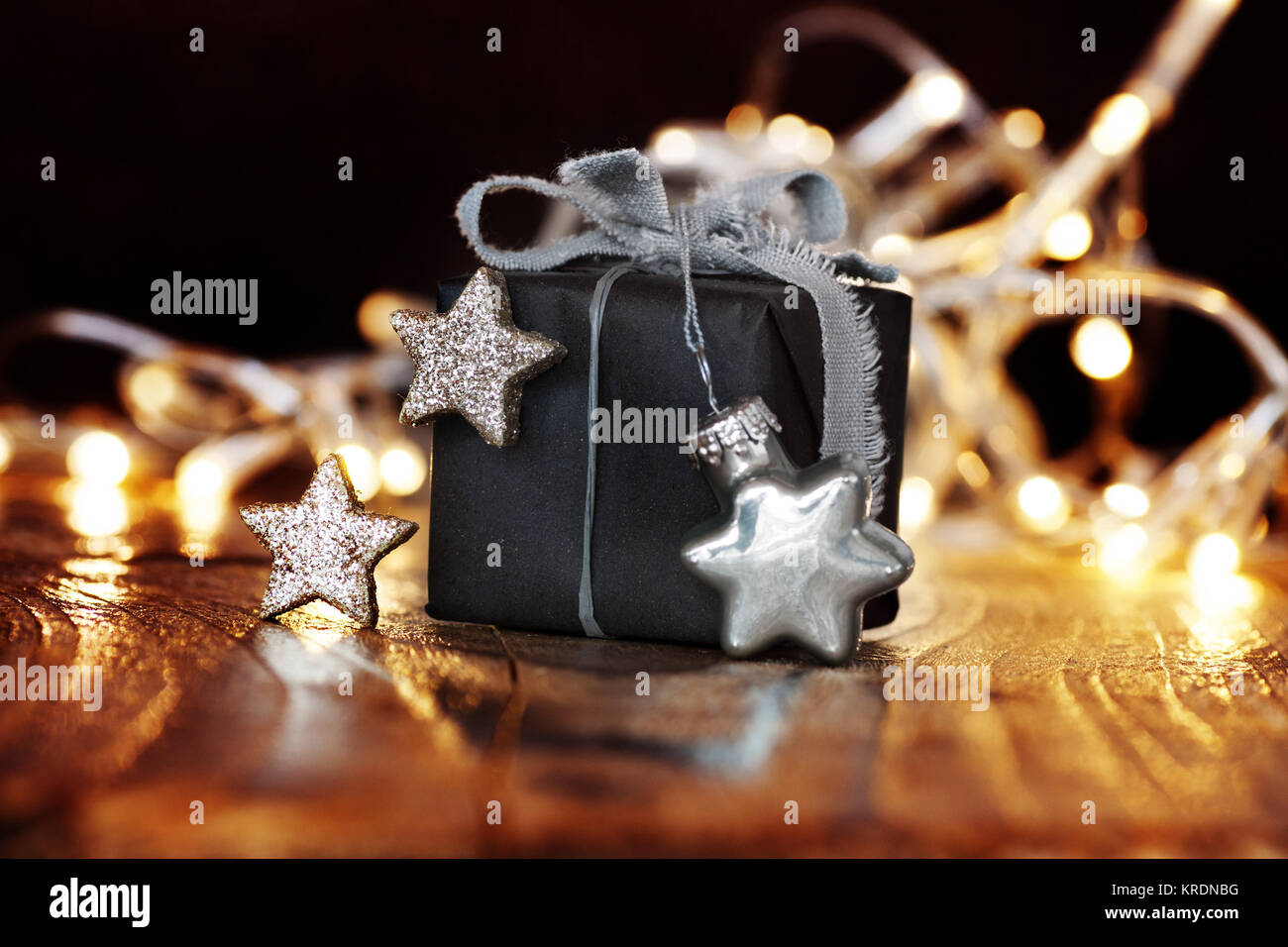christmas gift with silver stars Stock Photo - Alamy