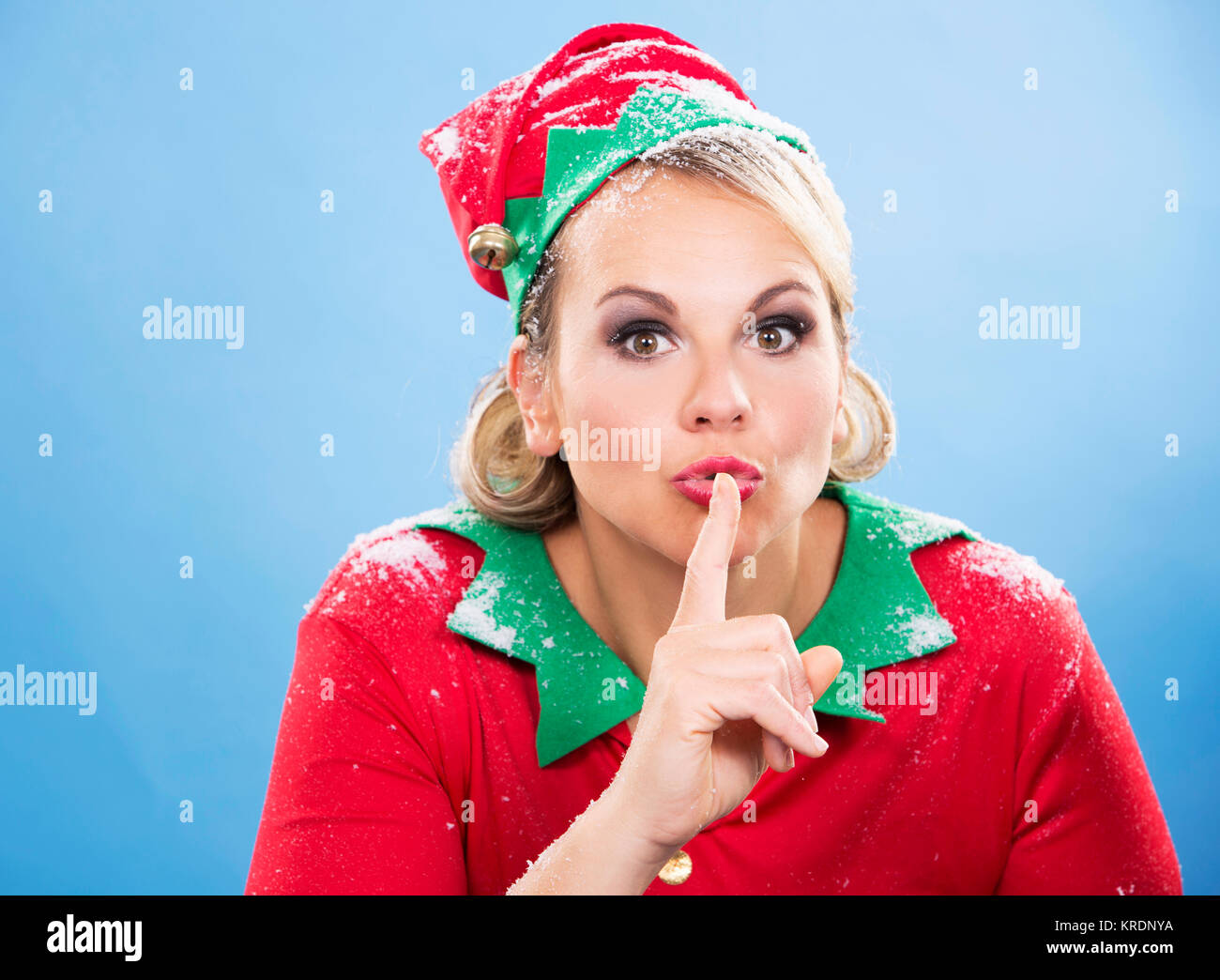blond elf female holding presents Stock Photo - Alamy