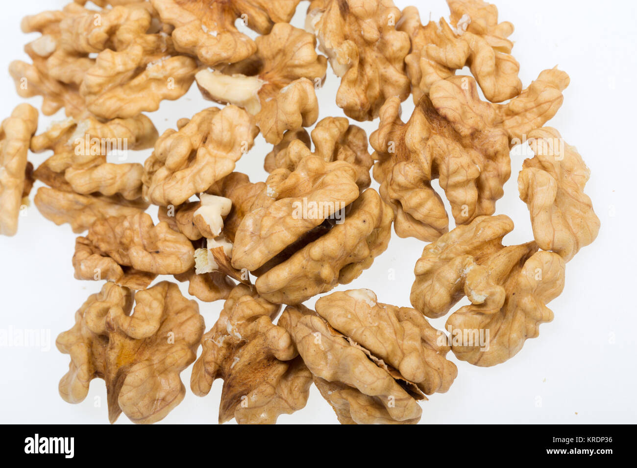 cracked walnut isolated on the white background Stock Photo - Alamy