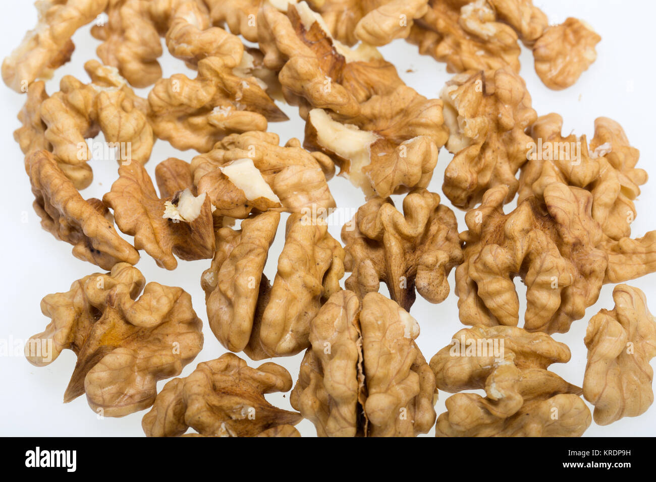 cracked walnut isolated on the white background Stock Photo - Alamy