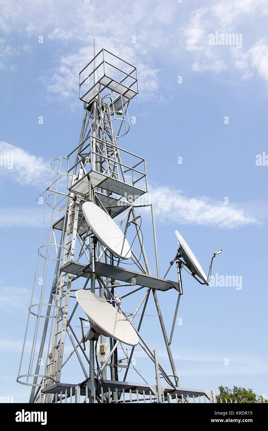 transmission towers of a radio station in front of blue sky Stock Photo ...