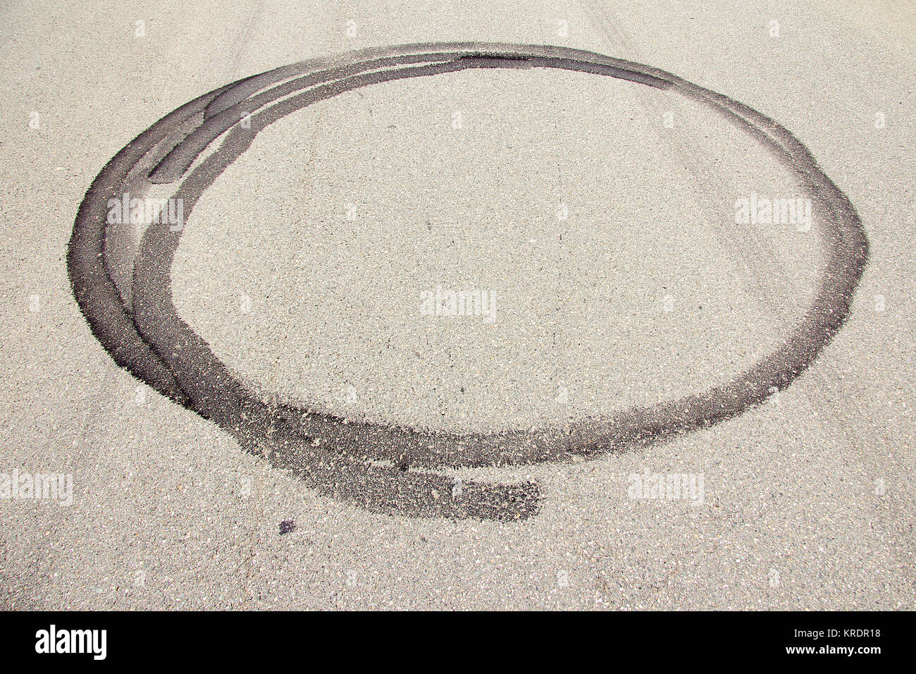 tire tracks around on asphalt Stock Photo - Alamy