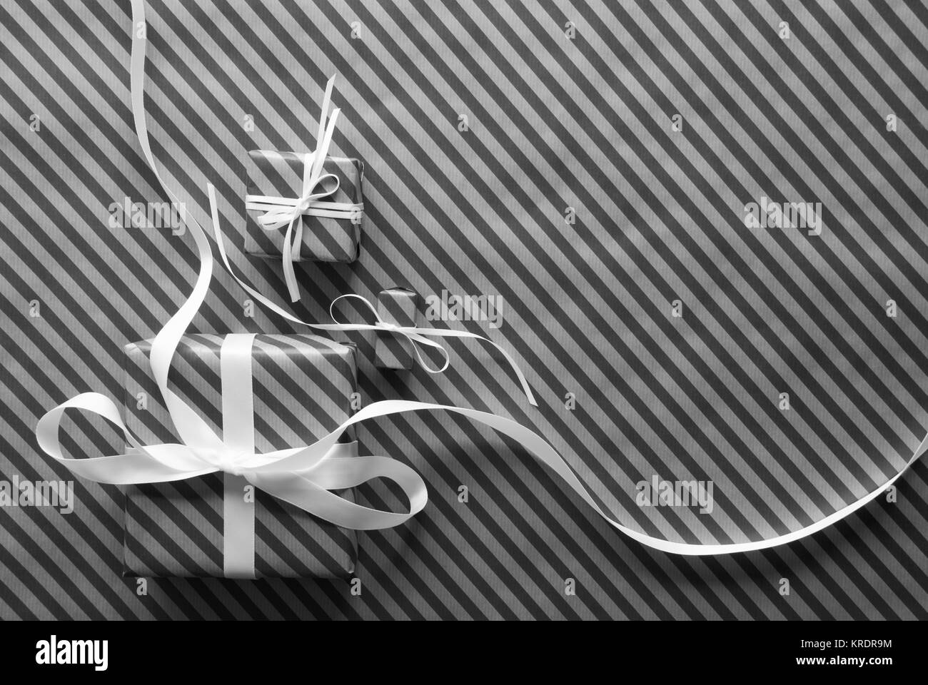Two Gifts Or Presents With White Ribbon. Black And White Striped ...