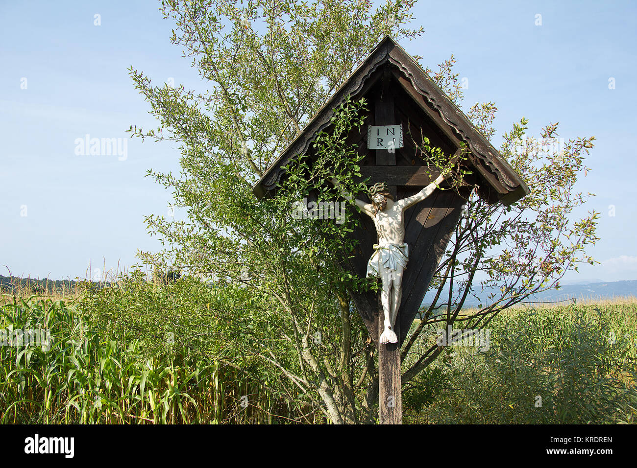 catholic cross with jesus in the wild Stock Photo - Alamy