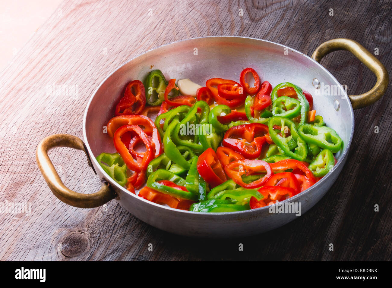 Chopped green red yellow peppers hi-res stock photography and images ...