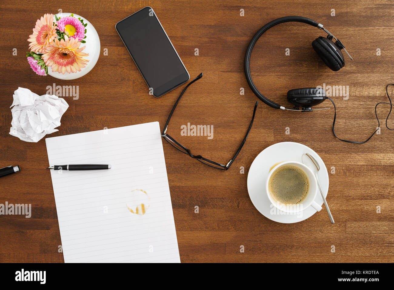 Desktop scene on wooden table Stock Photo - Alamy