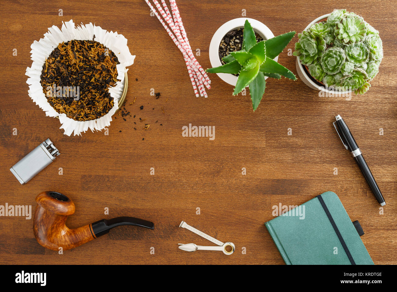 Desktop scene on wooden table Stock Photo - Alamy