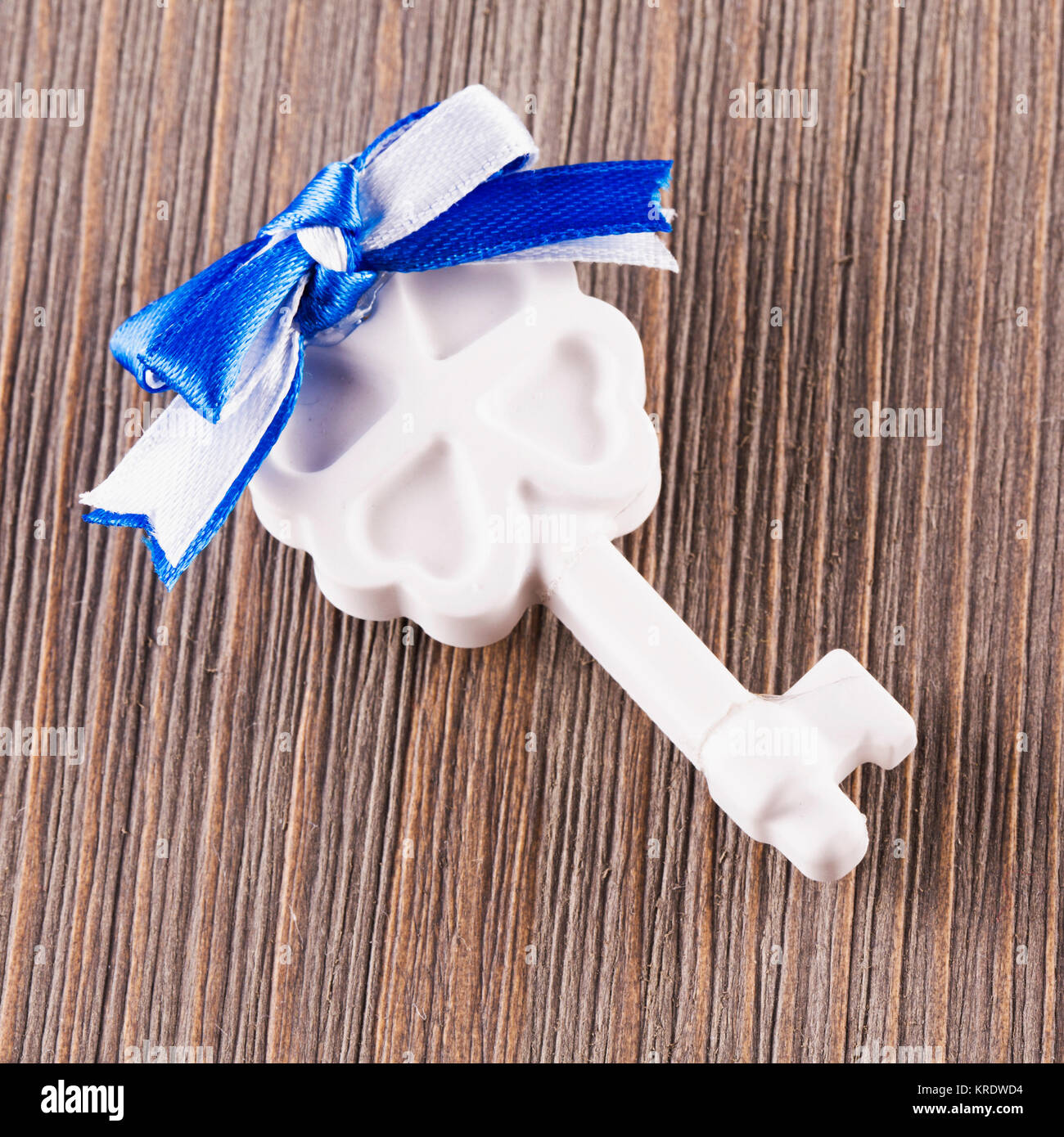 White ceramic key Stock Photo - Alamy