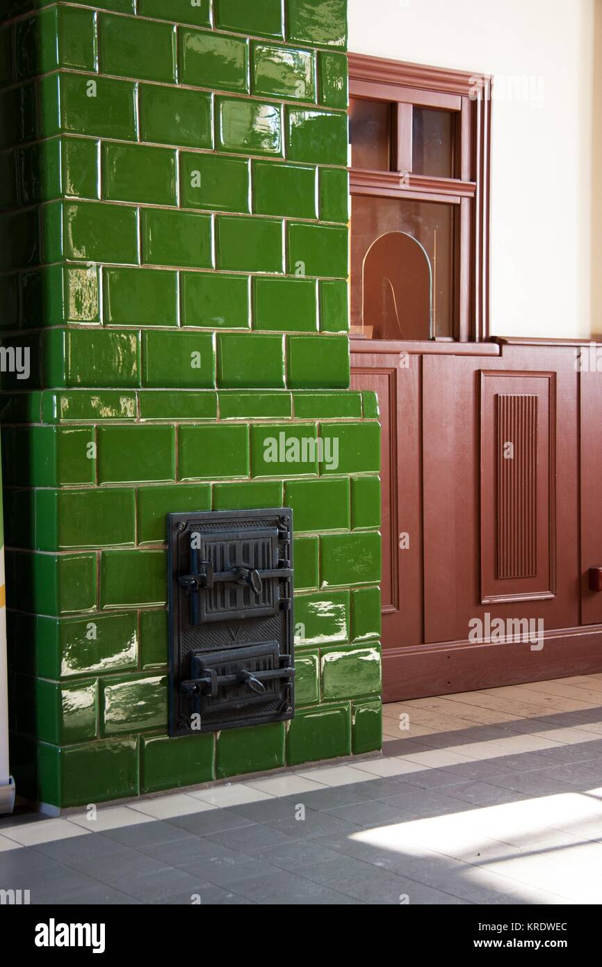 green tiled stove Stock Photo - Alamy