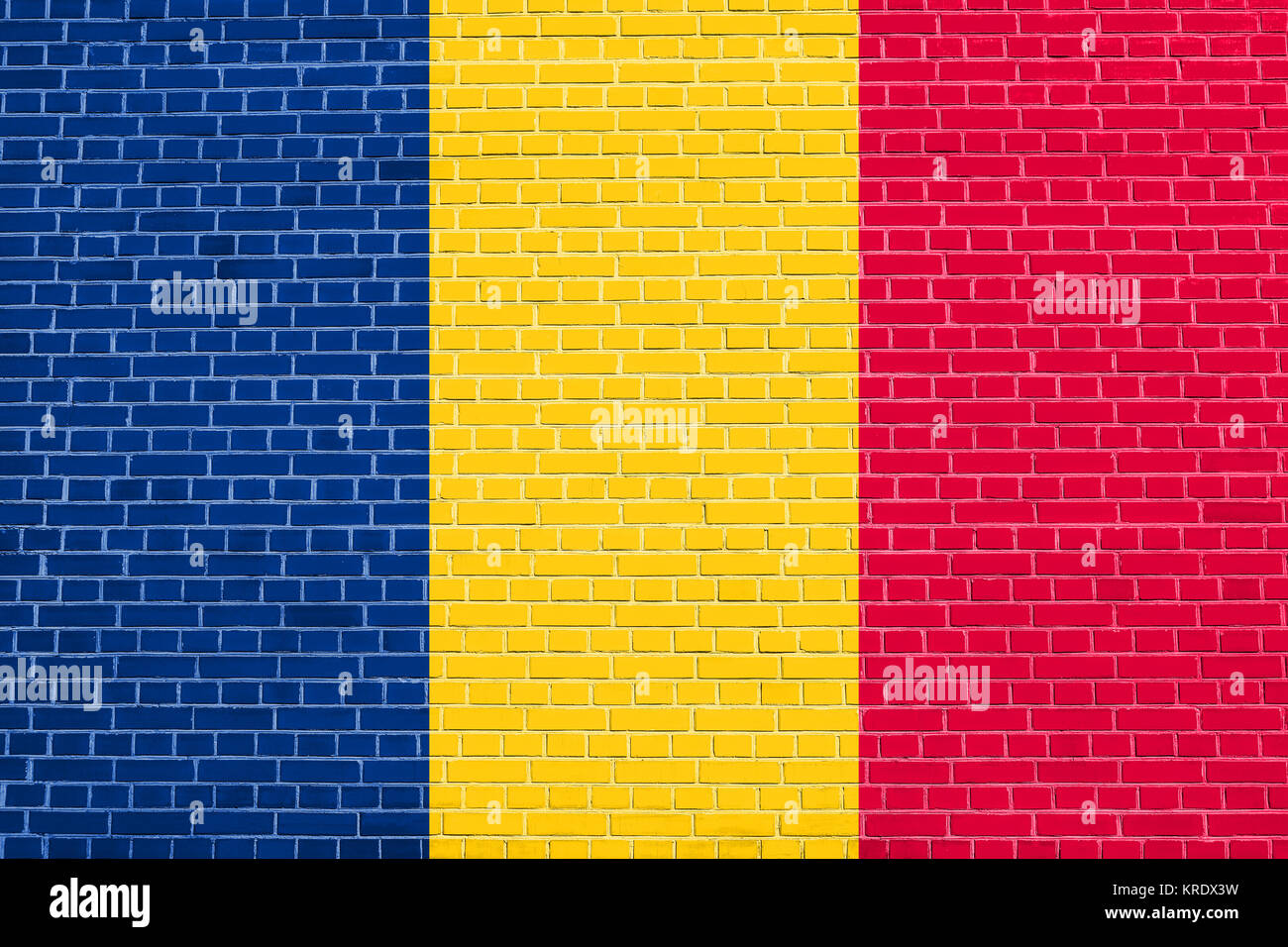 Flag of Chad on brick wall texture background Stock Photo - Alamy