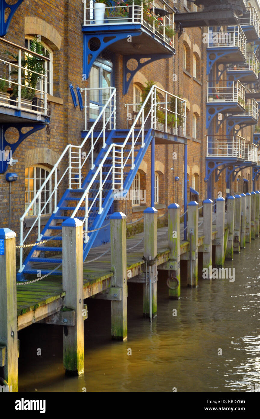 Old warehouses and docks buildings on the river thames in central ...