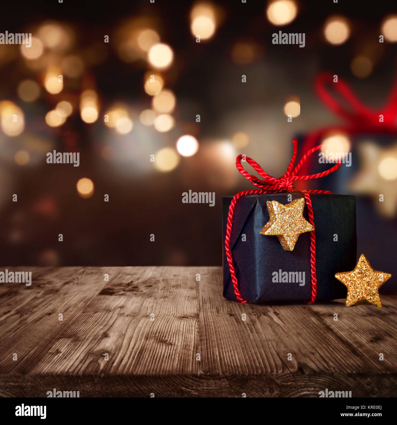 christmas package with festive background Stock Photo - Alamy