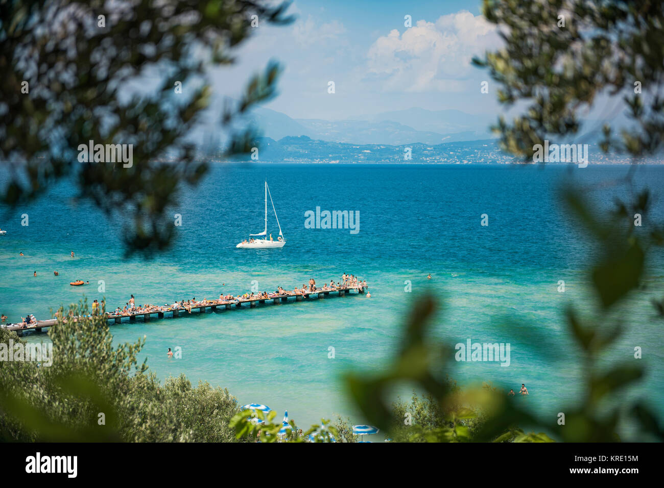 Beautiful beach and blue water in a summer day Stock Photo - Alamy