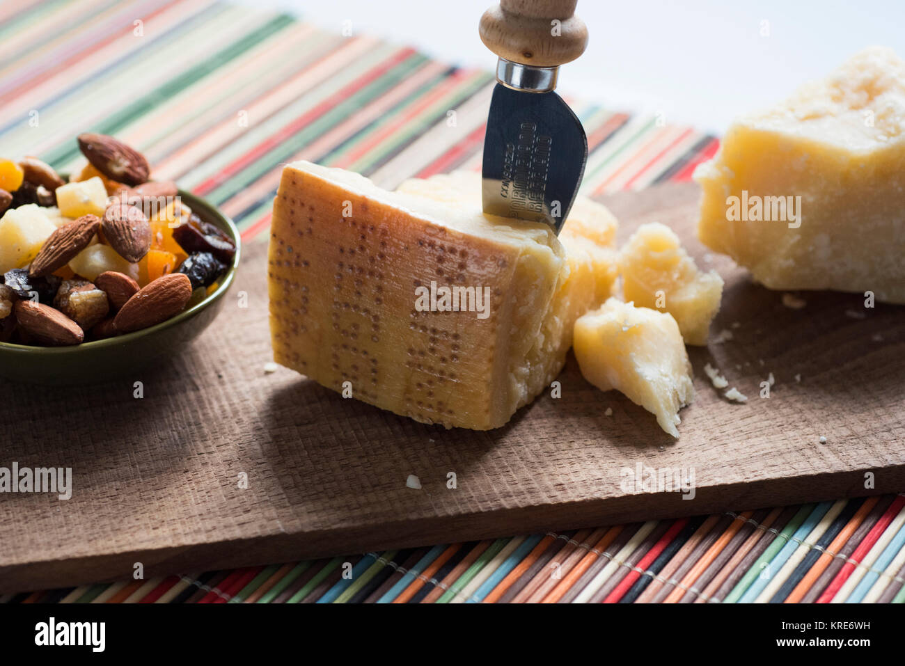 Cheese board with mixed nuts Stock Photo - Alamy