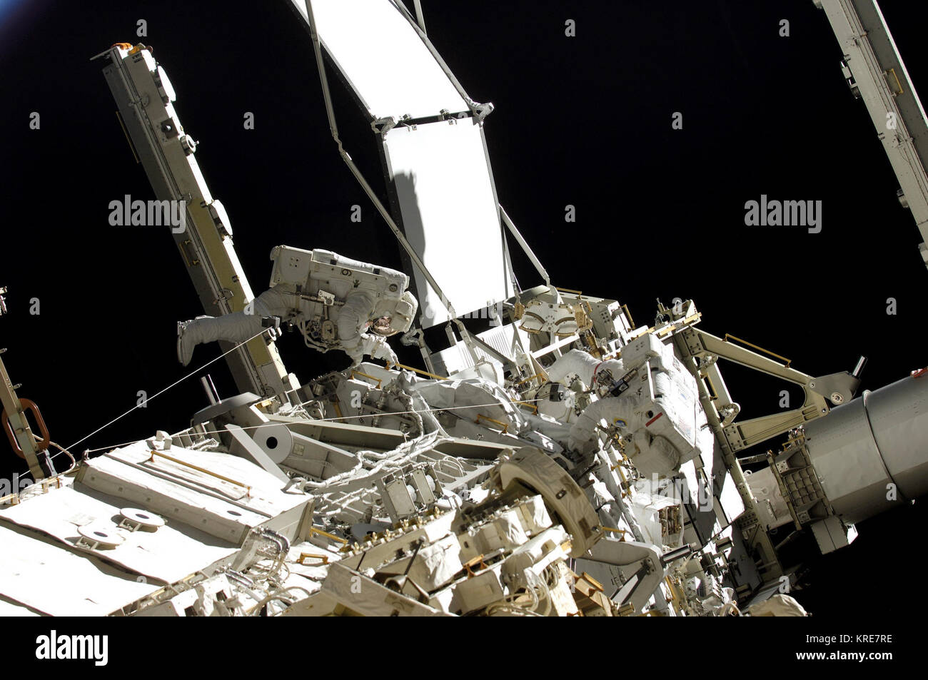 STS117 Reilly Olivas EVA1 Stock Photo - Alamy